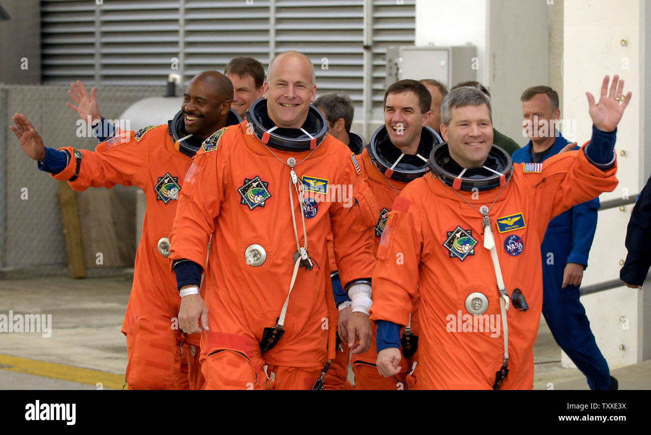 The astronaut crew of NASA's Space Shuttle Atlantis depart from their ...