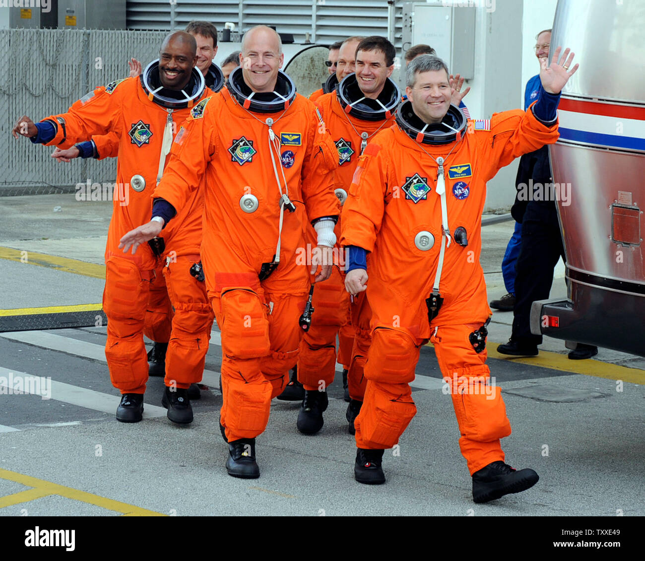 The astronaut crew of NASA's Space Shuttle Atlantis depart from their ...