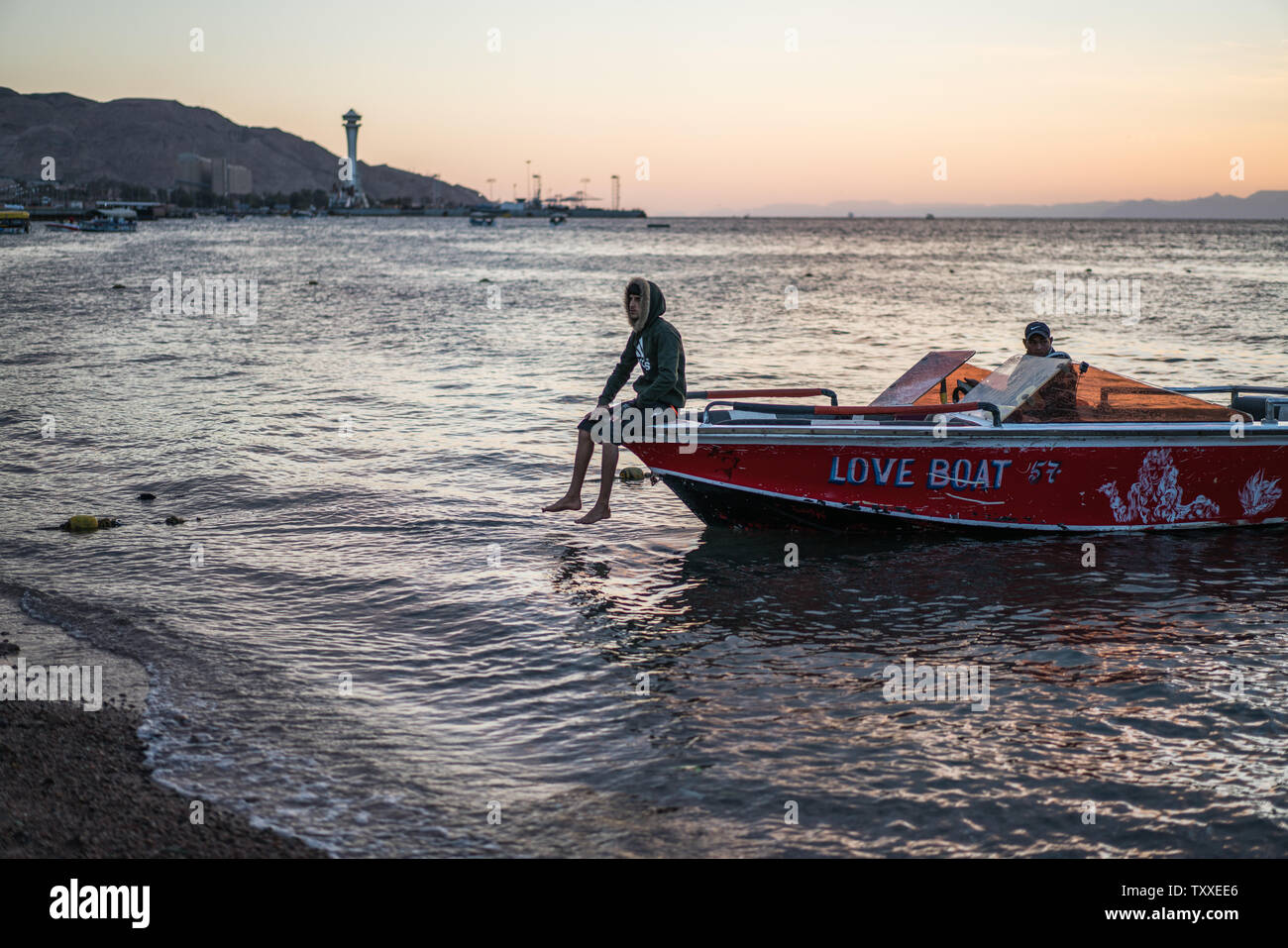Local people on the beach, Aqaba, Jordan Stock Photo - Alamy
