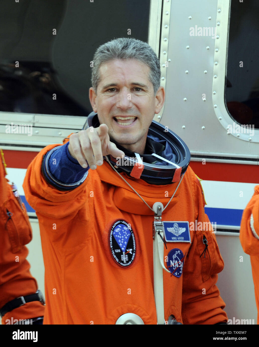 STS 125 Mission Specialist 1, Michael Good poses for media prior to ...