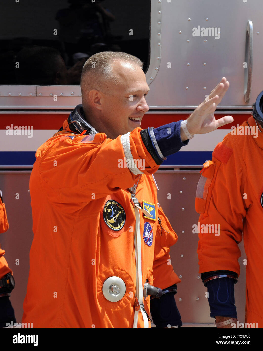 STS 127 Pilot Doug Hurley poses for media prior to departing for space ...