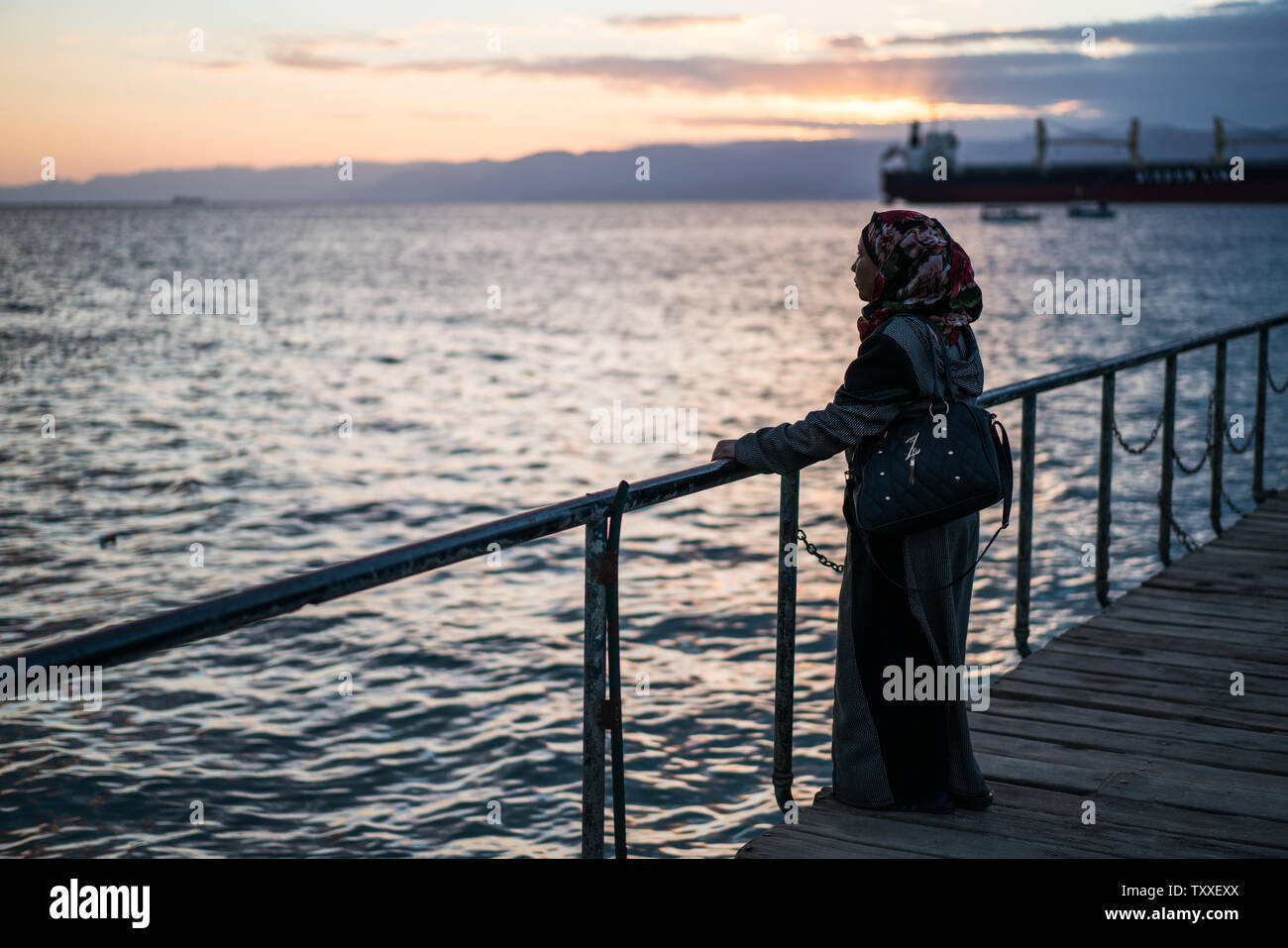 Local people on the beach, Aqaba, Jordan Stock Photo - Alamy