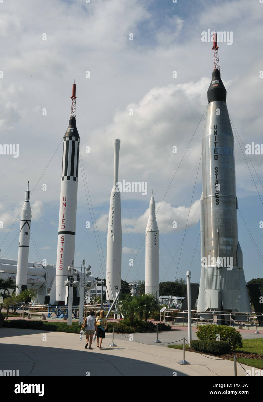 Visitors walk through the rocket garden at the NASA's Kennedy Space ...
