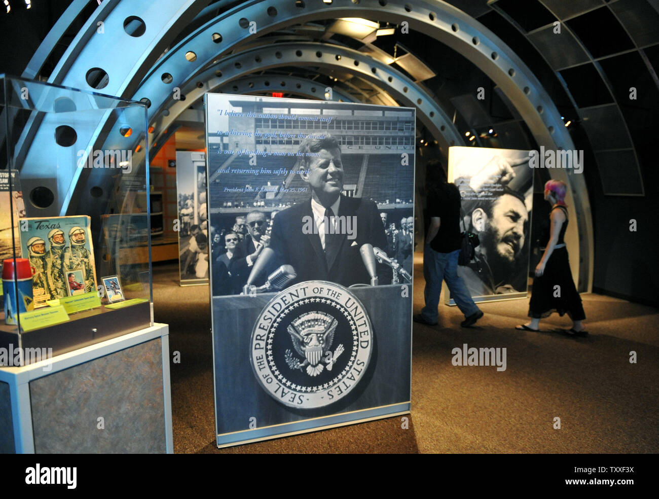 Visitors walk through an exhibit inside NASA's Kennedy Space Center ...