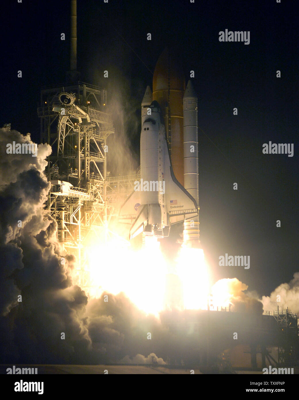 NASA's space shuttle "Endeavour" launches at 4:14:08 AM on mission STS ...
