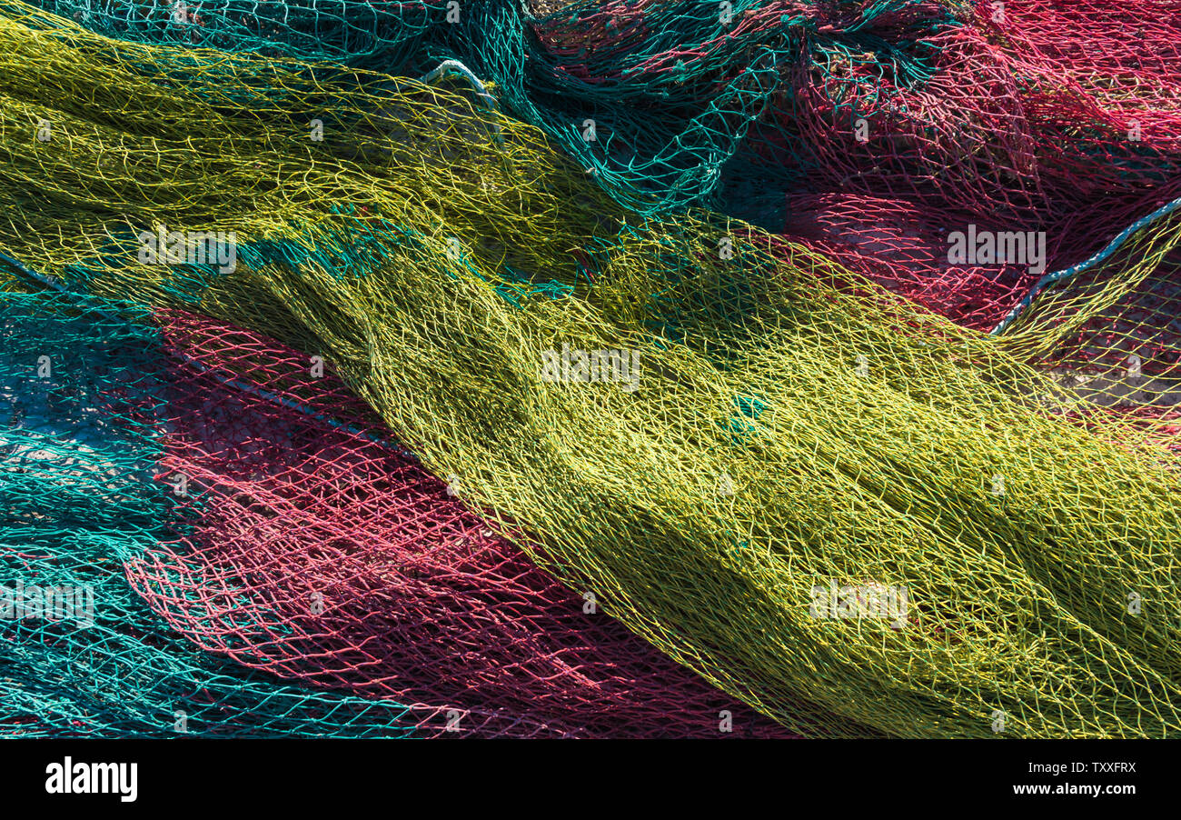 Multi colored fishing nets hi-res stock photography and images - Alamy