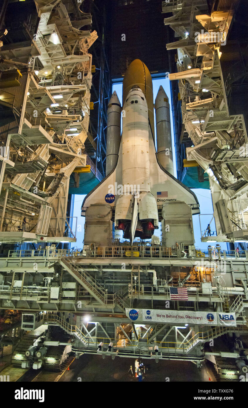 NASA'S Space Shuttle Discovery departs from inside the Vehicle Assembly ...
