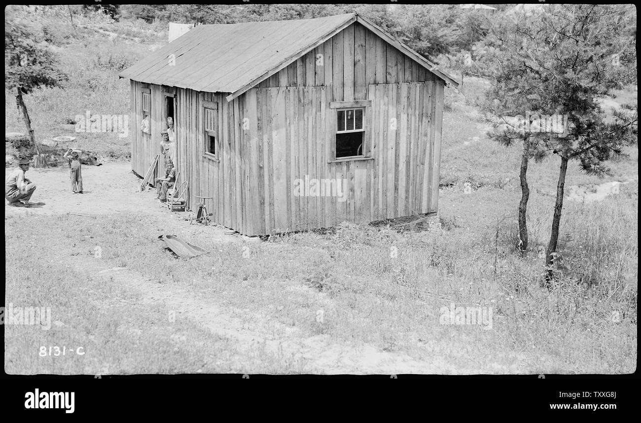 Booth, Preston; family in doorway of home Stock Photo - Alamy
