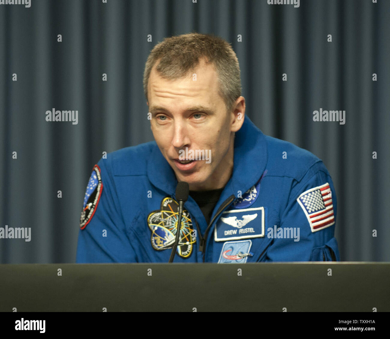 Crew member and Mission Specialist Andrew Feustel, attends a post ...