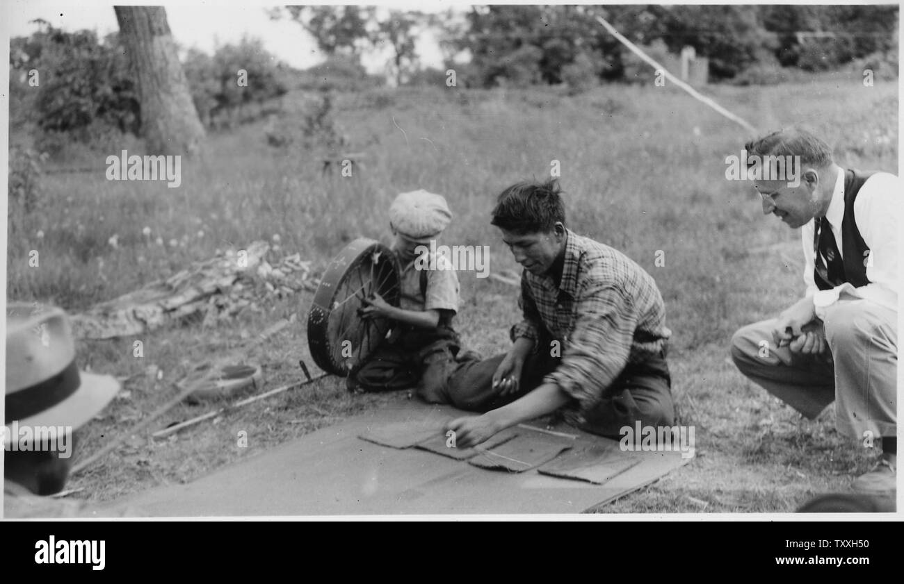 Moccasin game Black and White Stock Photos & Images - Alamy