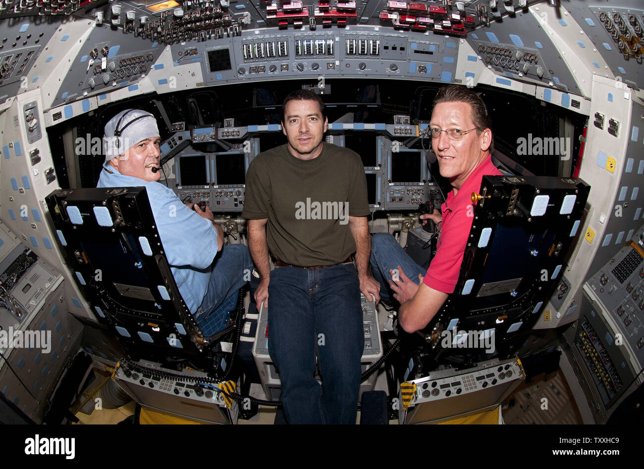 Spacecraft Operators William Powers (l) Gary Hamilton (c) and Charles ...