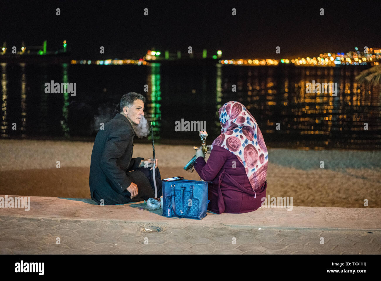 Local people on the beach, Aqaba, Jordan Stock Photo - Alamy