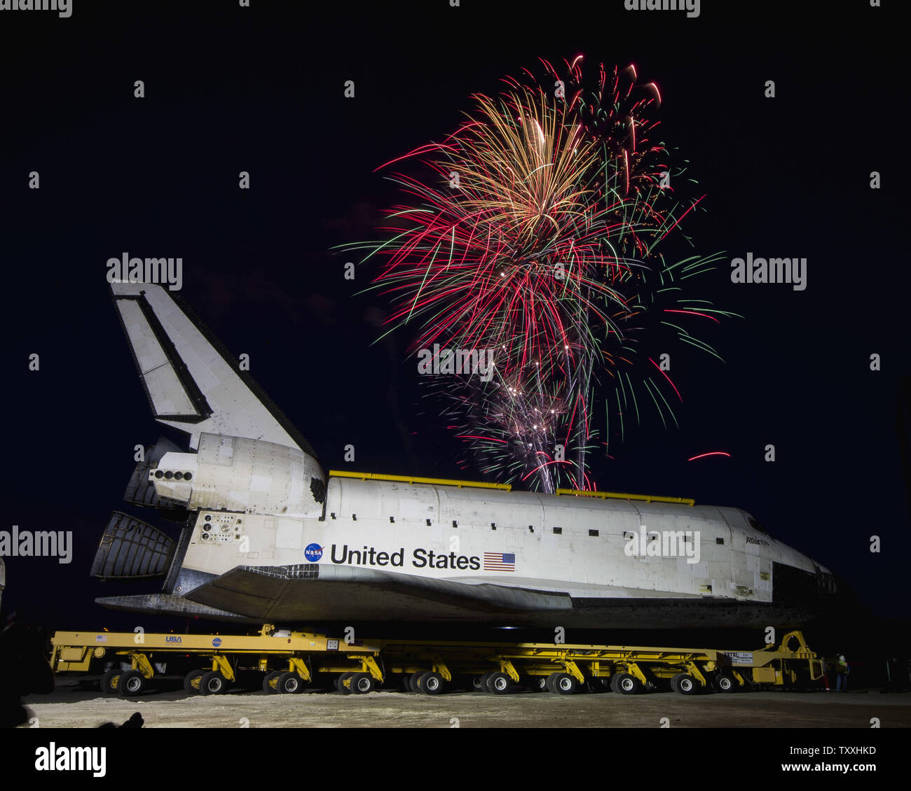NASA's space shuttle "Atlantis" is showered with fireworks at the ...