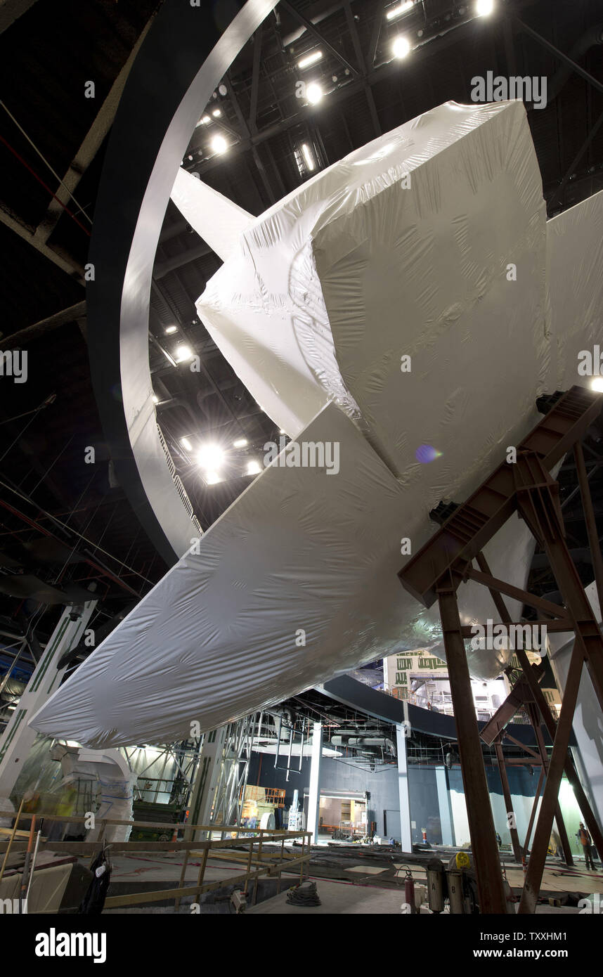 NASA's Space Shuttle Atlantis remains under wraps at the Kennedy Space ...