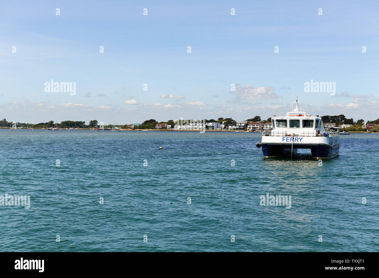 Mudeford Ferry transporting passengers to and from Mudeford Spit ...