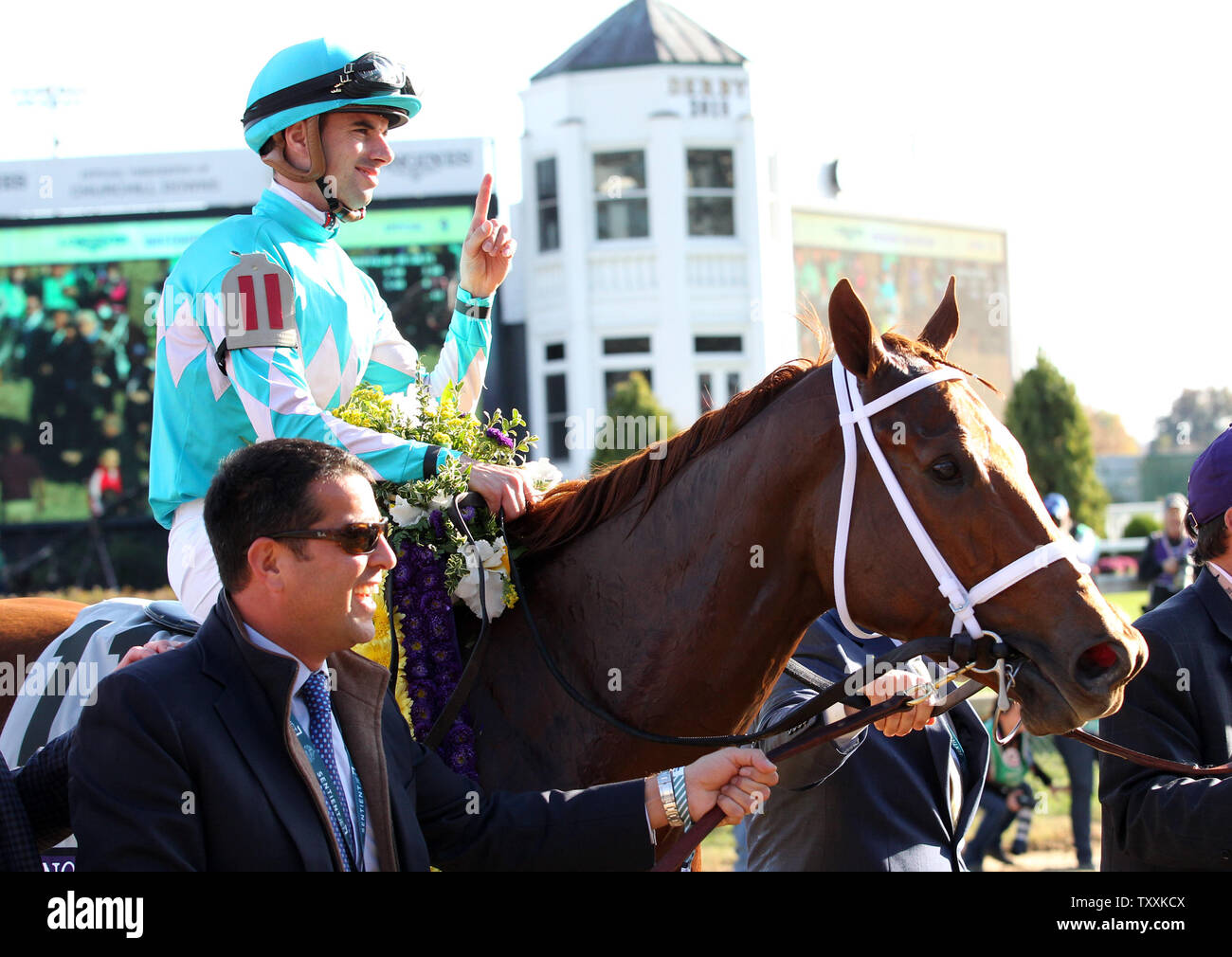 Jockey Florent Geroux celebrates after riding Monomoy Girl to victory ...