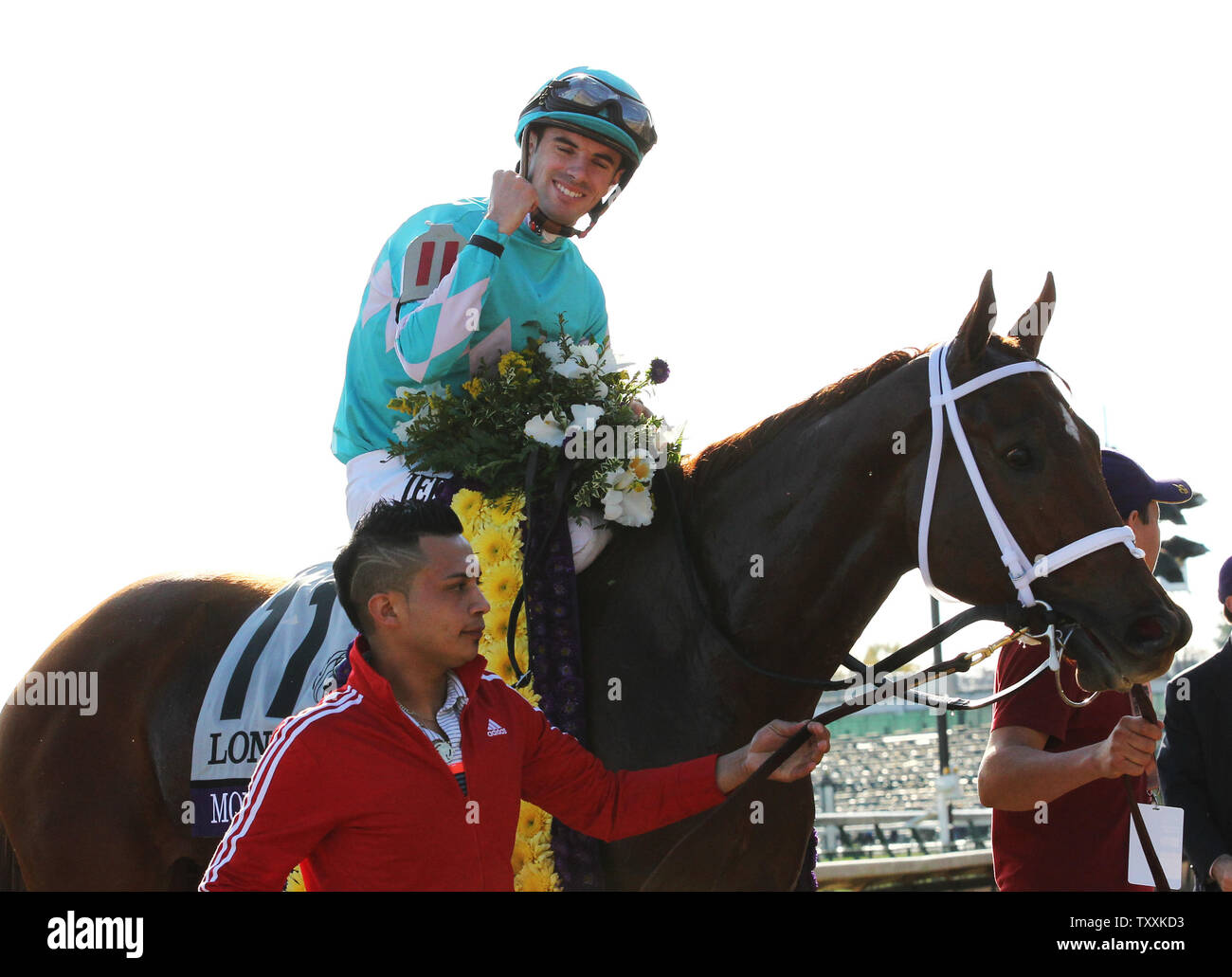 Jockey Florent Geroux celebrates after riding Monomoy Girl to victory ...
