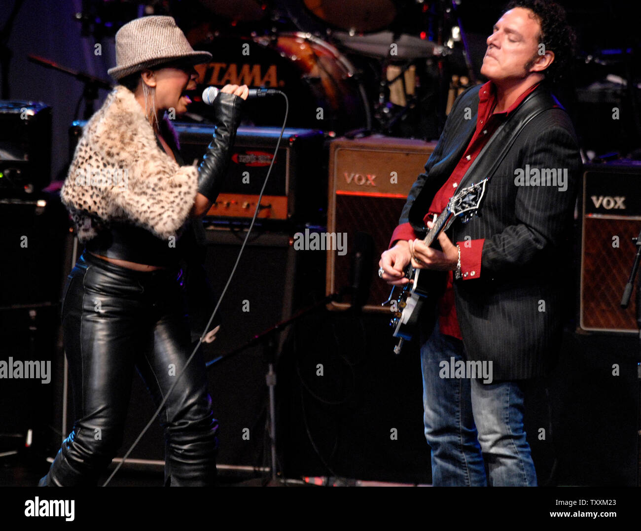 Singer Shayna Steele (L) and guitarist Neal Schon perform at the Les ...