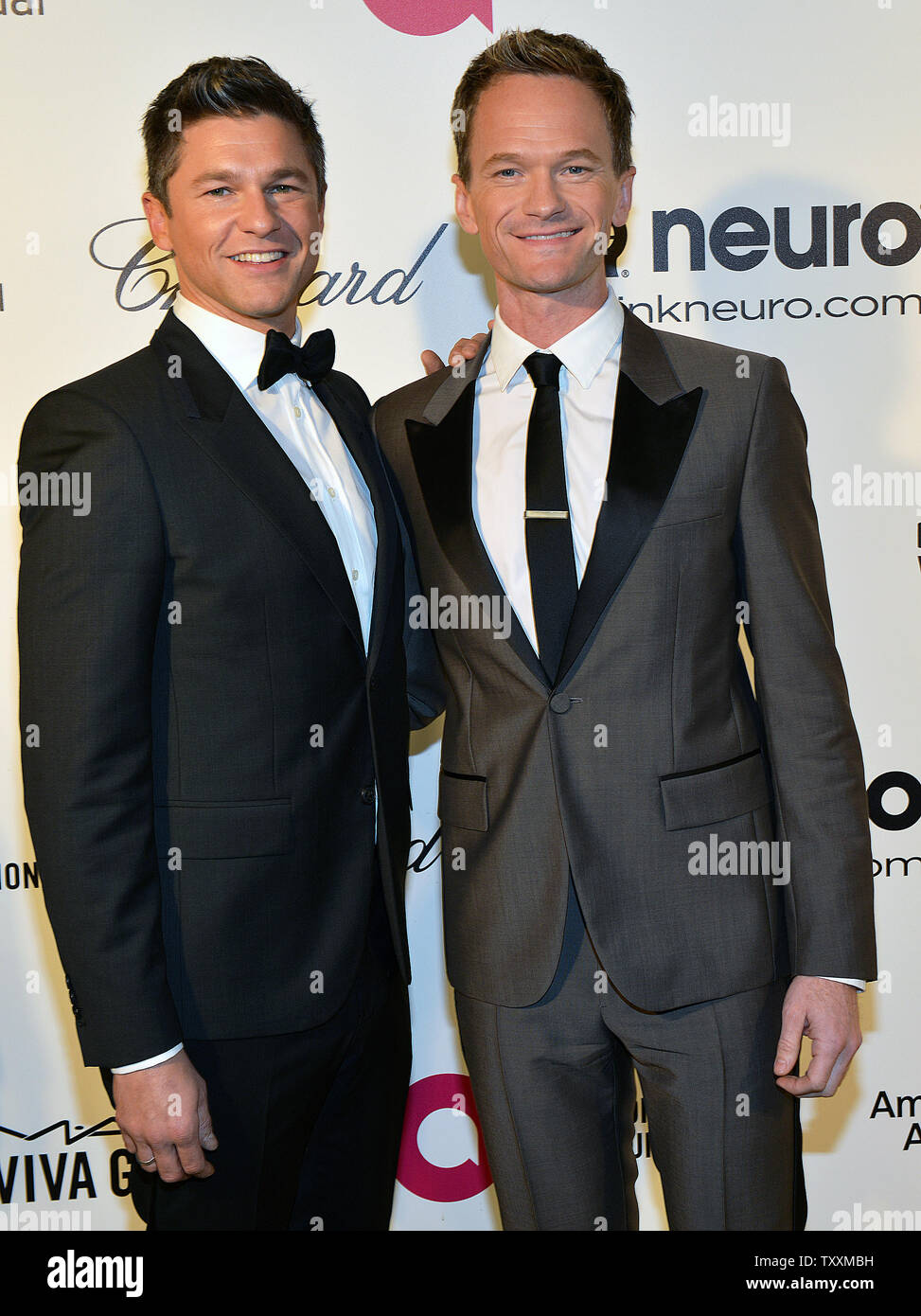 Actor Neil Patrick Harris (R) and his partner David Burtka arrive for ...