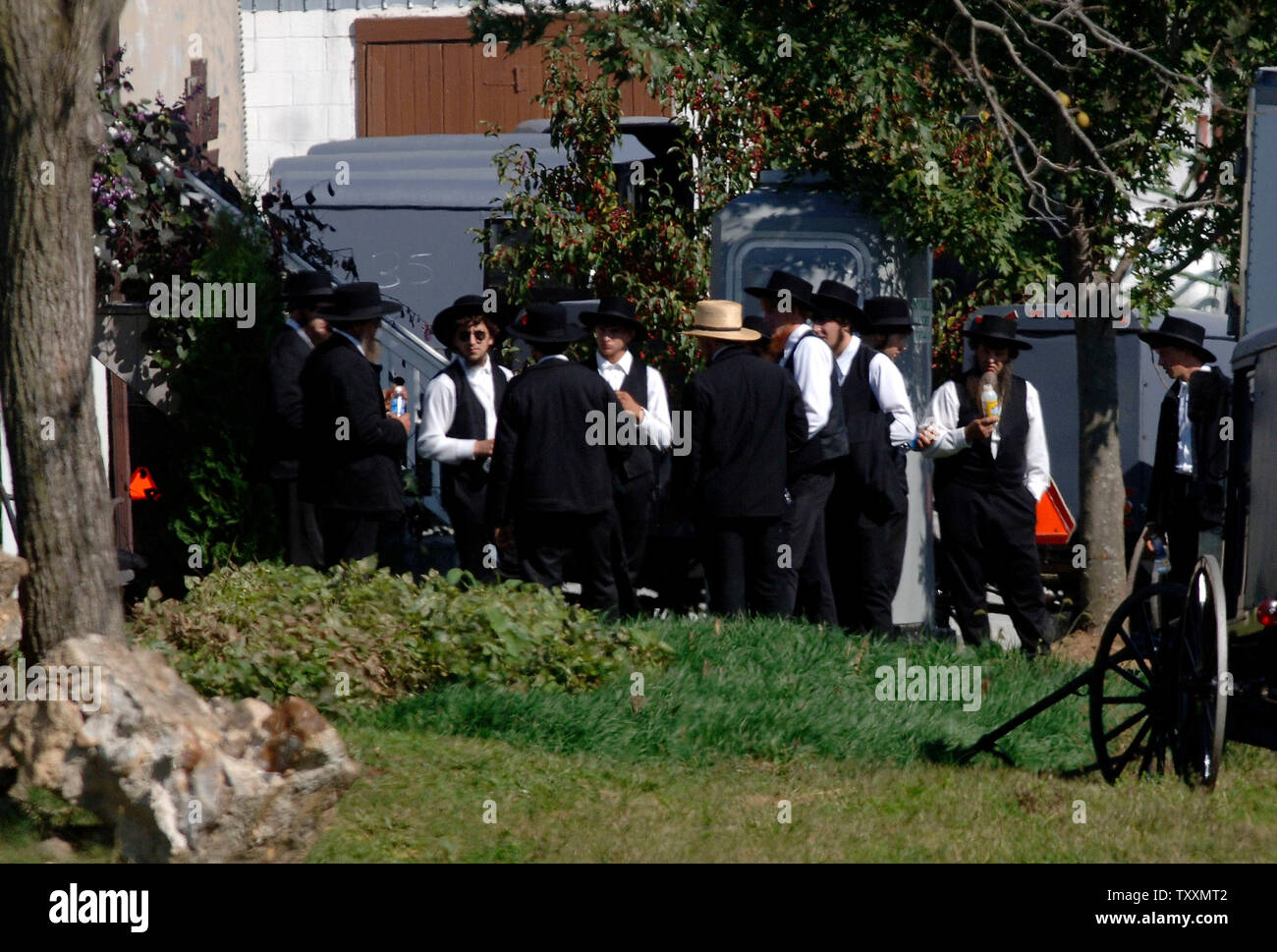 Members of the Amish community gather for the funerals of sisters Mary ...