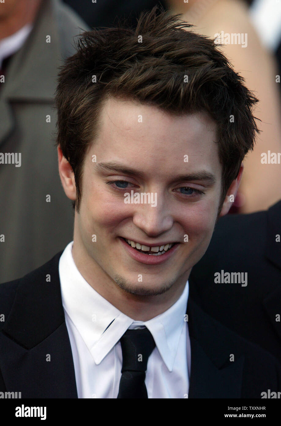 Actor Elijah Wood poses for photographers during the 76th Annual ...
