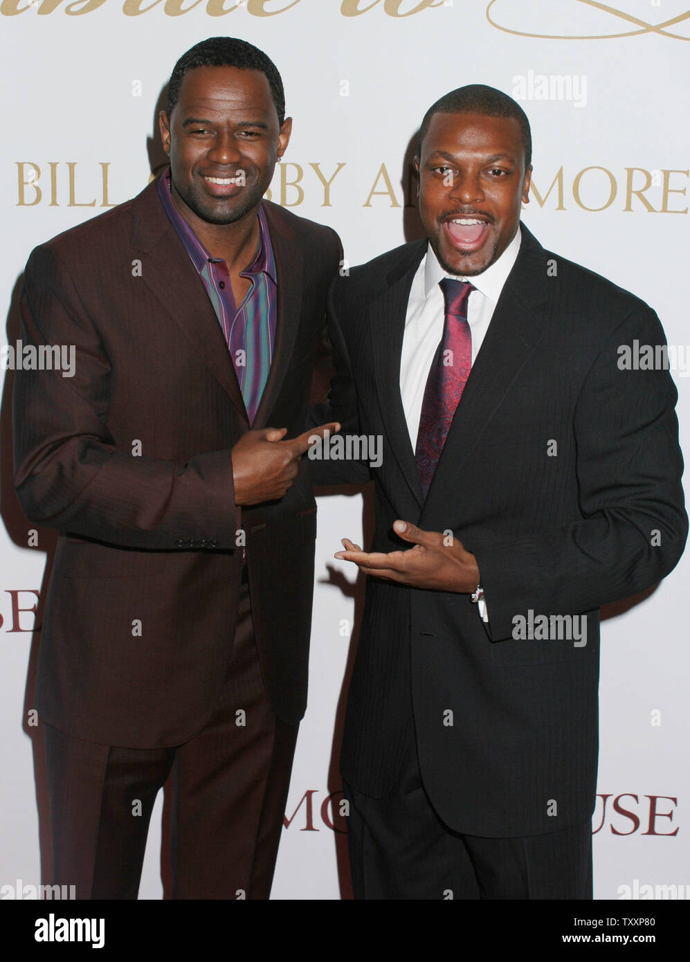 Singer Brian McKnight, left, and actor Chris Tucker pose for ...