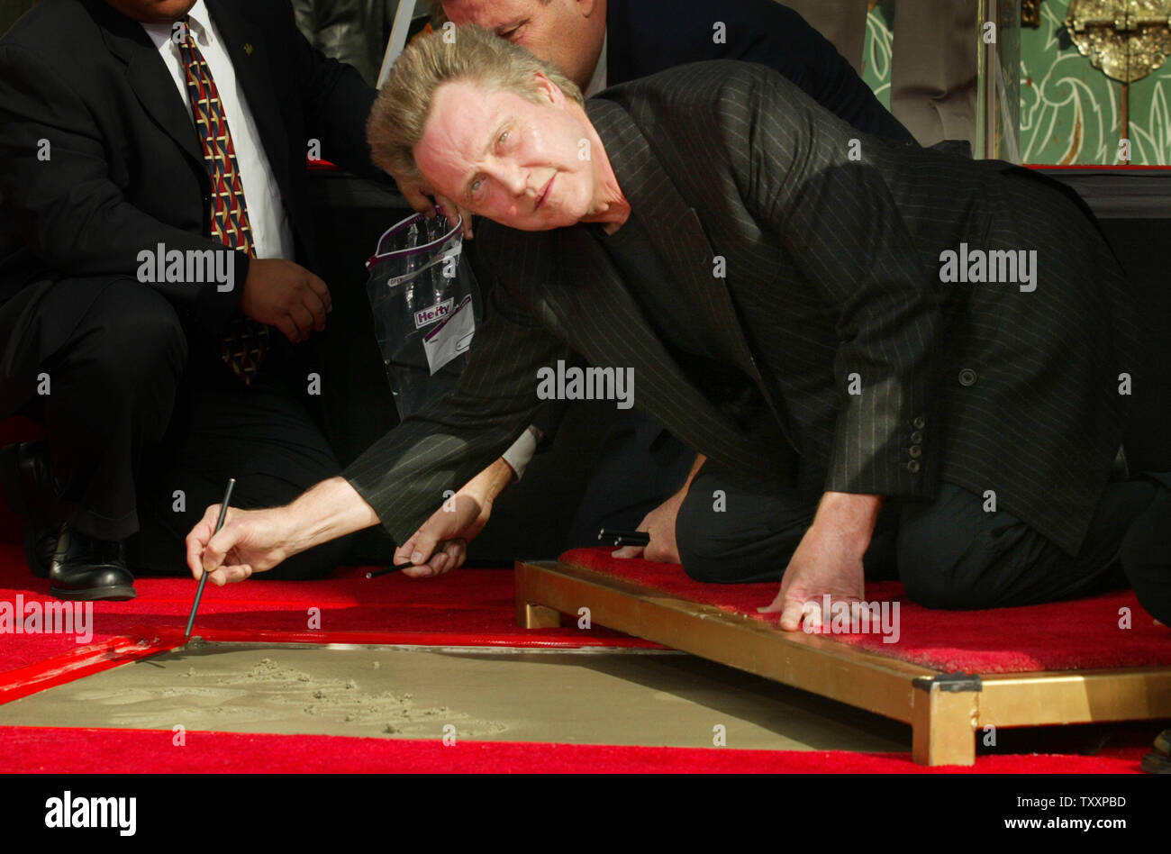 Academy Award winning actor Christopher Walken signs his name into ...
