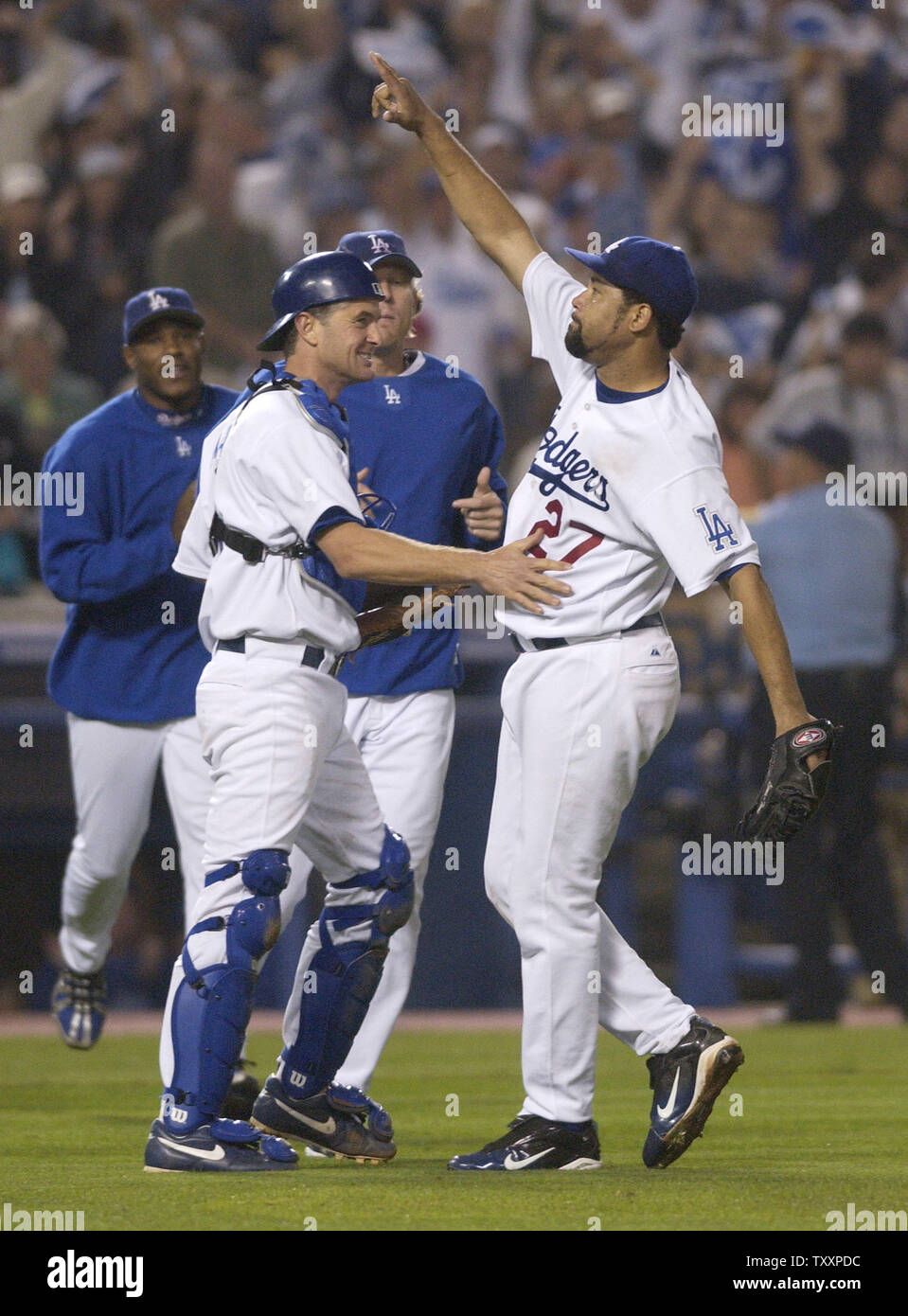 Los Angeles Dodgers pitcher Jose Lima (R) celebrates with catcher Brent ...