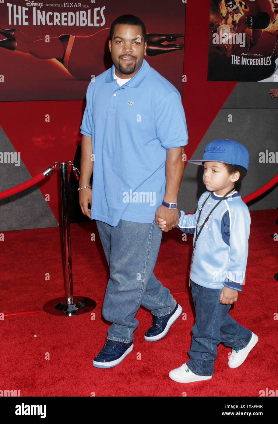 Actor Ice Cube, left, and his son, arrive as guests at the premiere of ...