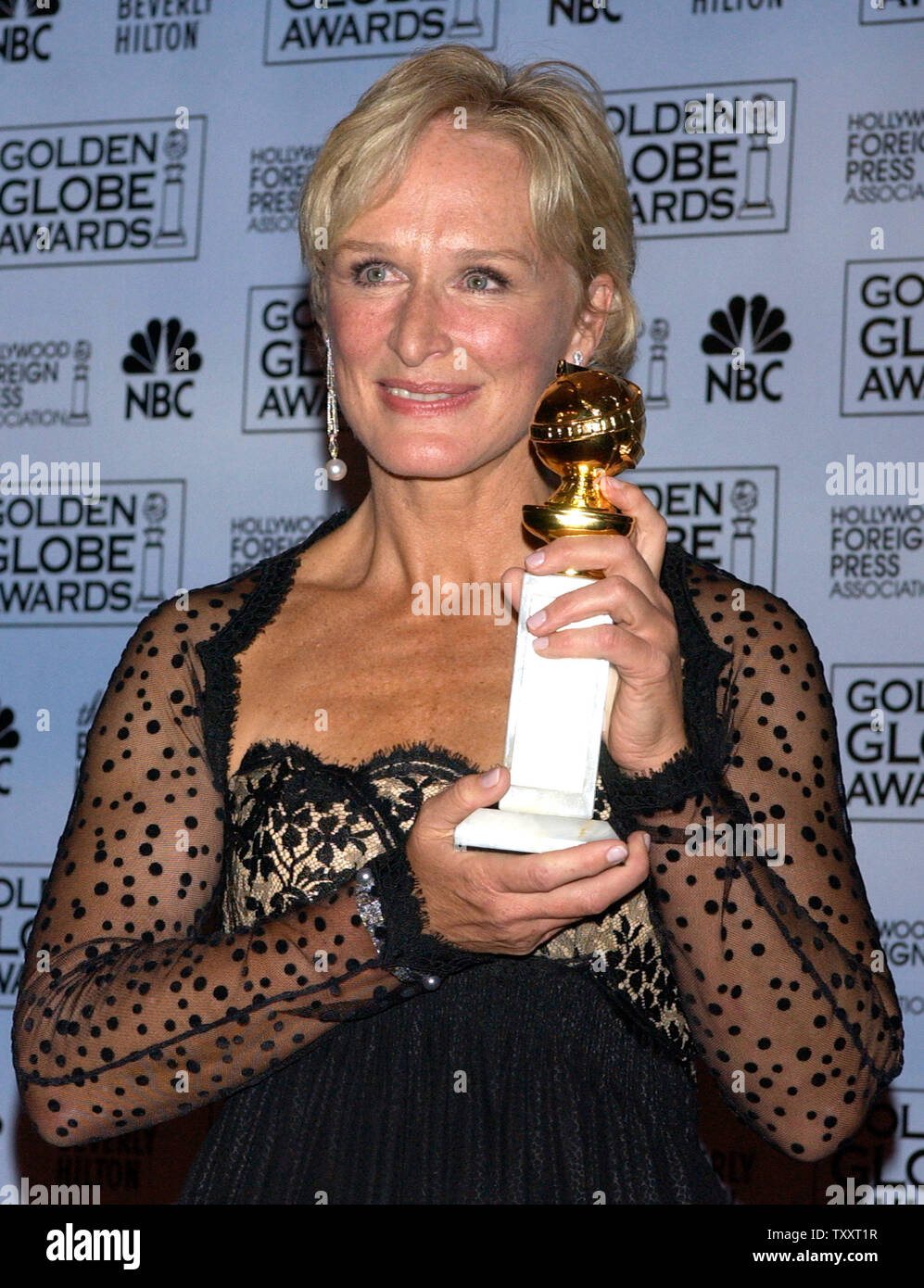 Glenn Close shows off her award for Best performance by an actress in a ...