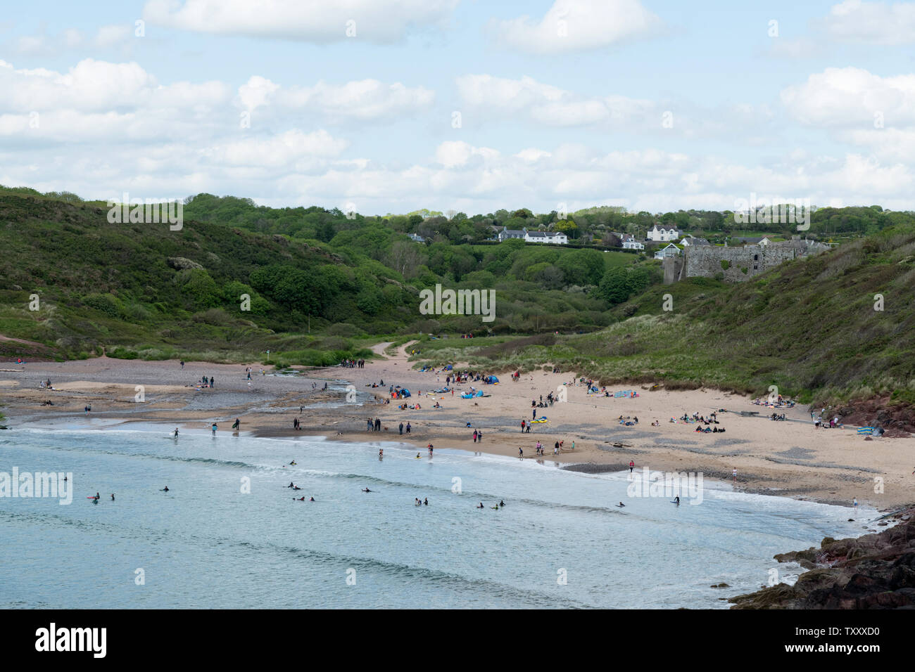 Manorbier Castle and Monarbier Bay with coast path, Pembrokeshire ...