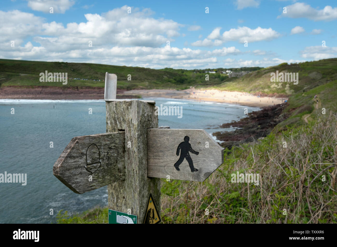 Manorbier Castle and Monarbier Bay with coast path, Pembrokeshire ...
