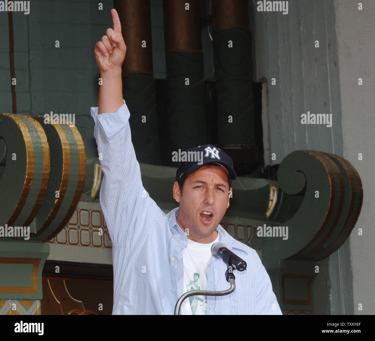 Actor Adam Sandler concludes his comments during a hand and footprint ...