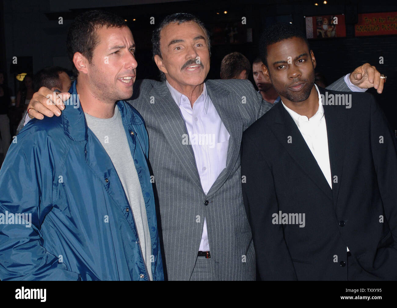 Actors Adam Sandler, Burt Reynolds and Chris Rock (L-R), cast members ...