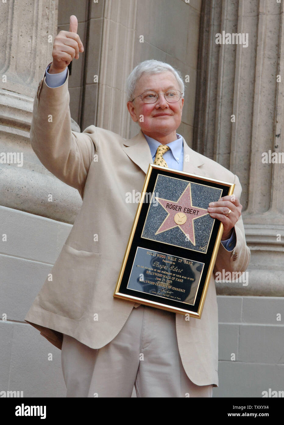 Film critic Roger Ebert gestures with a thumbs up during a Hollywood ...