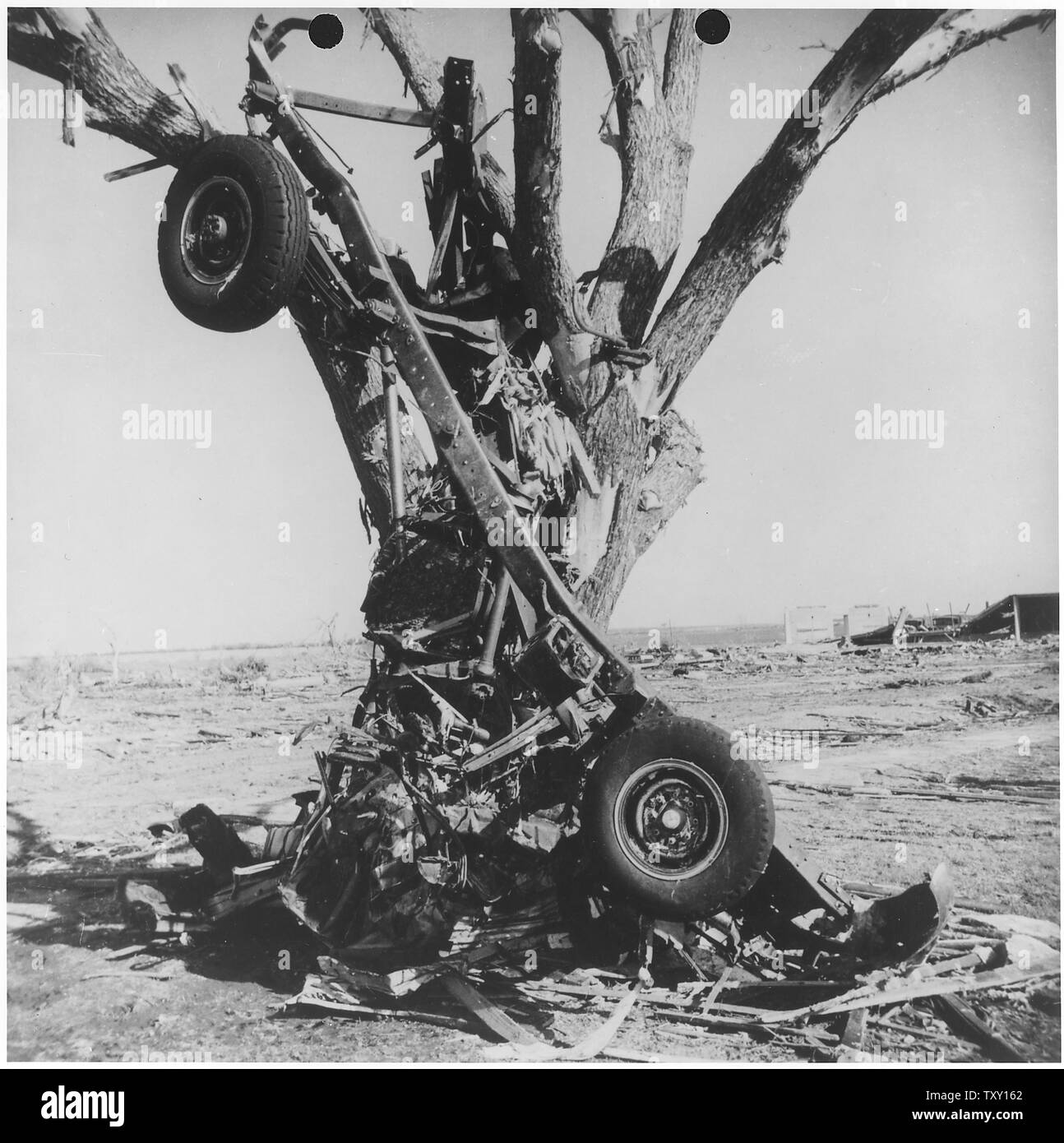 Car wrapped around large tree by tornado udall hi-res stock photography ...