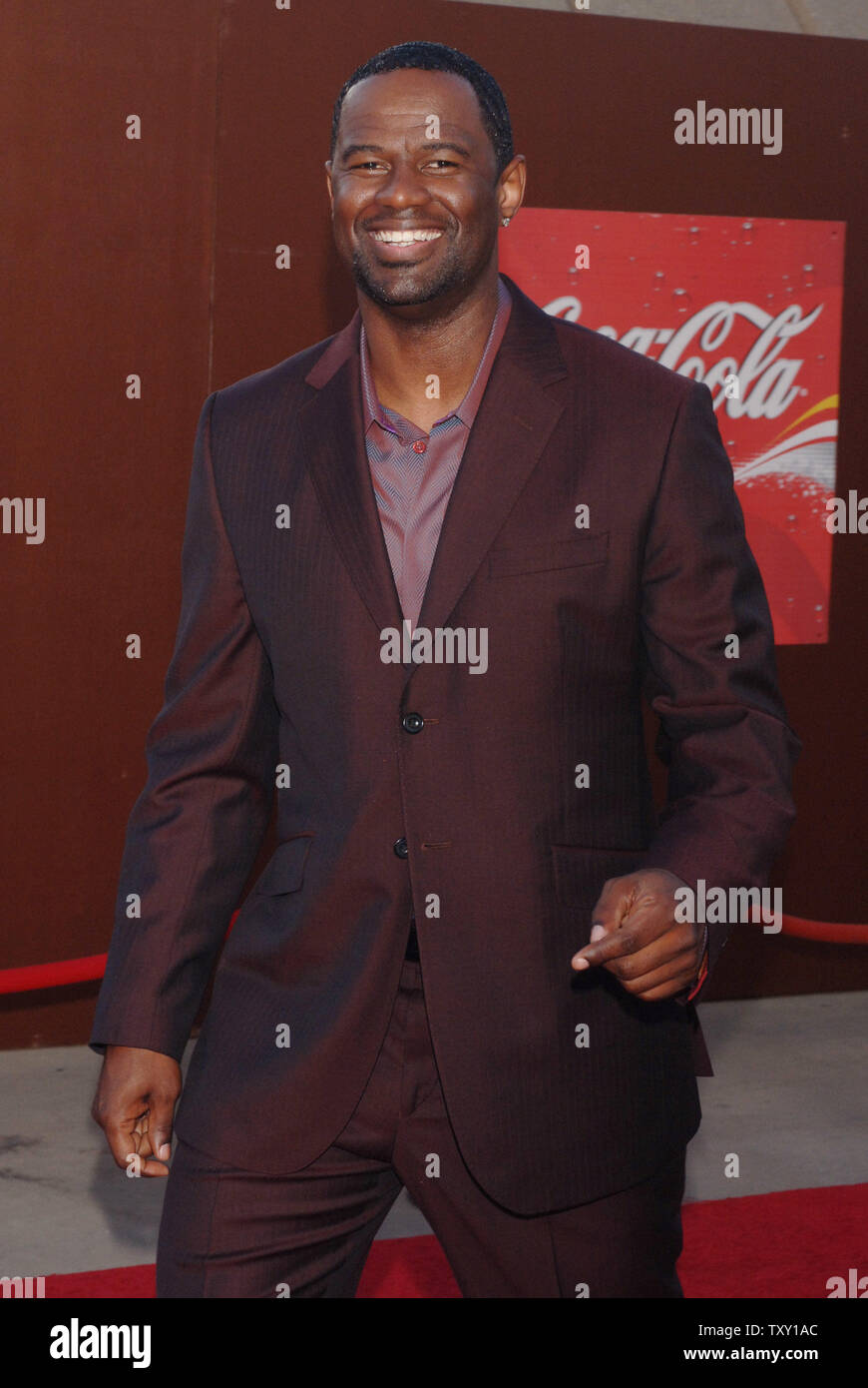 Singer Brian McKnight arrives at the tenth annual Soul Train Lady of ...