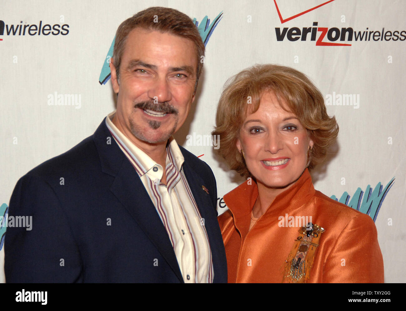 Victor Rivers (L) and Diane Mooney attend the LA County Commission on ...
