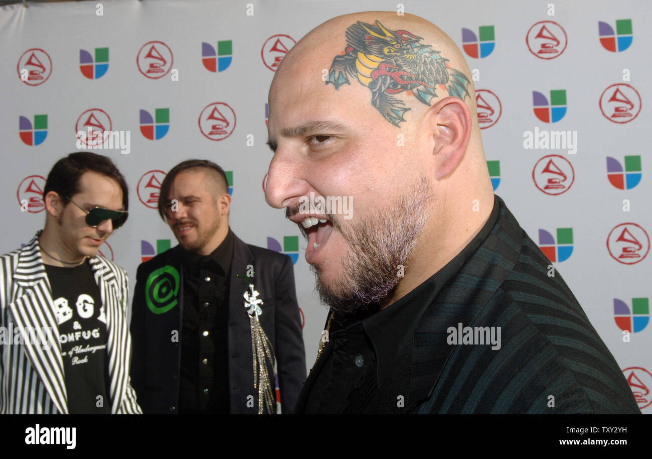 Fofe (R), lead singer for the Puerto Rican group Circo, arrives with ...