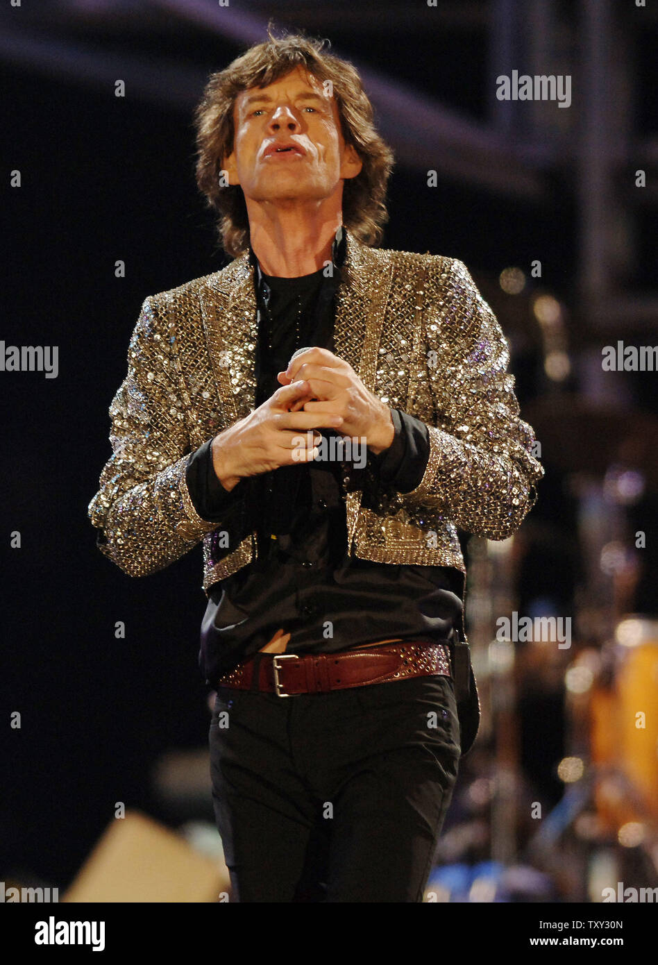 Mick Jagger, lead singer for the quintesential rock band the Rolling ...