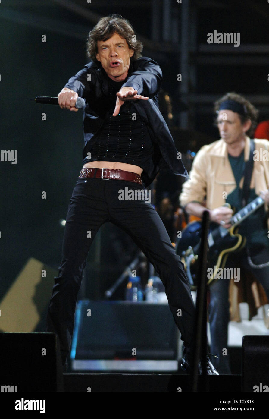 Mick Jagger (L), lead singer for the quintesential rock band the ...