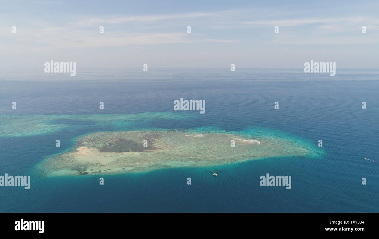 seascape aerial view coral reef, atoll with turquoise water in sea ...