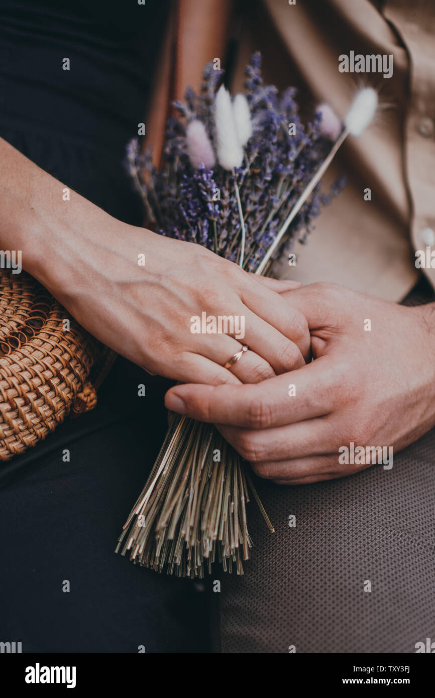 Flowers in girls hands hi-res stock photography and images - Alamy
