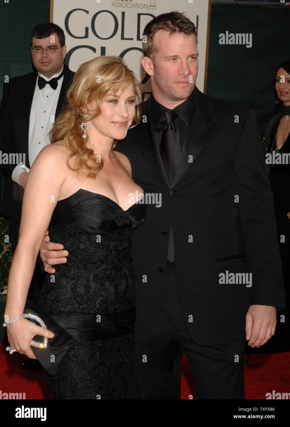 Actress Patricia Arquette and her husband, actor Thomas Jane arrive at ...