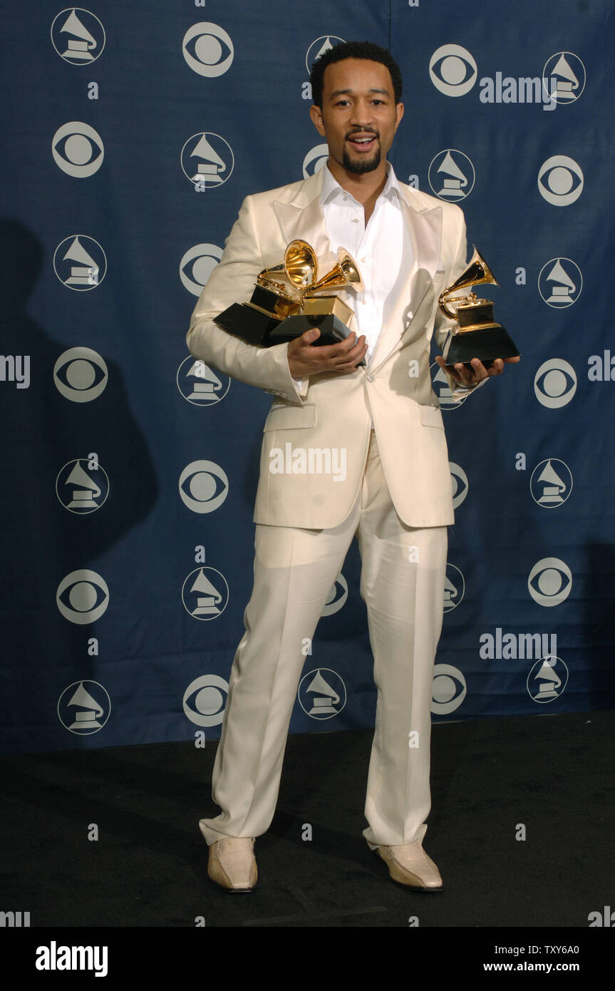 John Legend holds the Grammy awards he won for Best New Artist, Best R ...