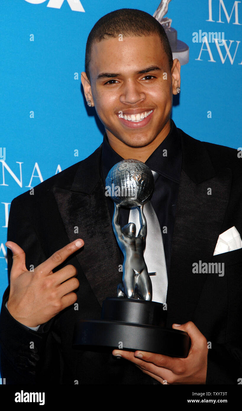 Singer Chris Brown appears backstage with the outstanding new artist ...