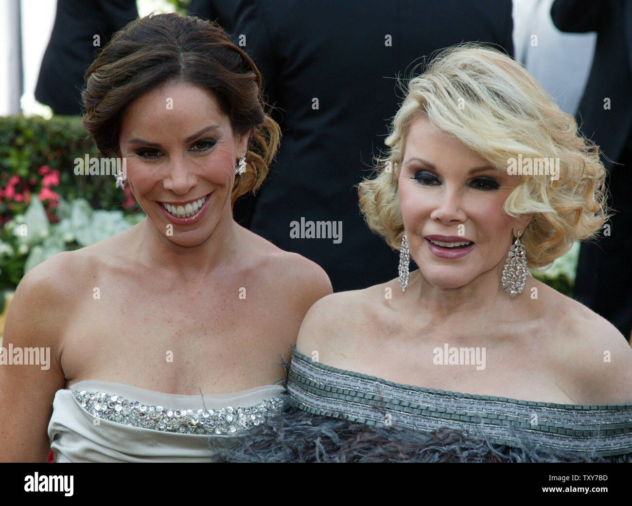 Joan Rivers (R) and her daughter Melissa Rivers arrive for the 78th ...