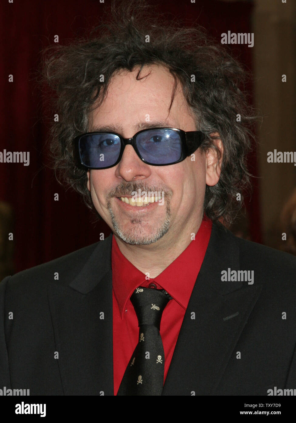 Director Tim Burton arrives for the 78th Annual Academy Awards at the ...
