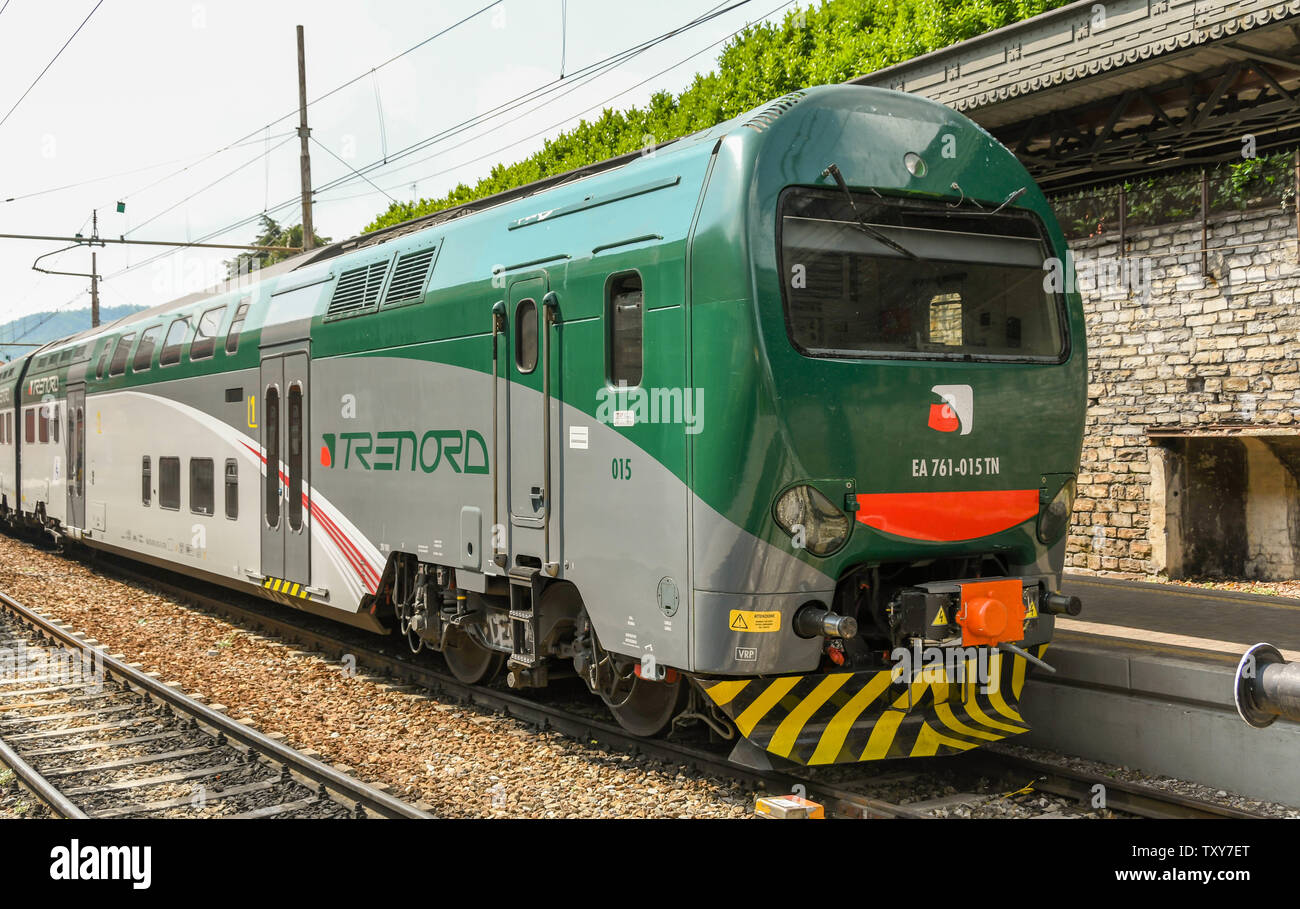 COMO, ITALY - JUNE 2019: Modern electric train in the town centre ...