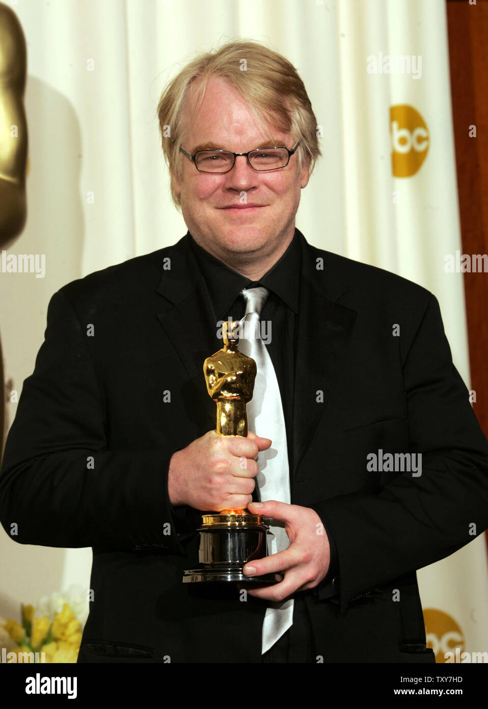 Actor Philip Seymour Hoffman poses with the Oscar he won for best actor ...